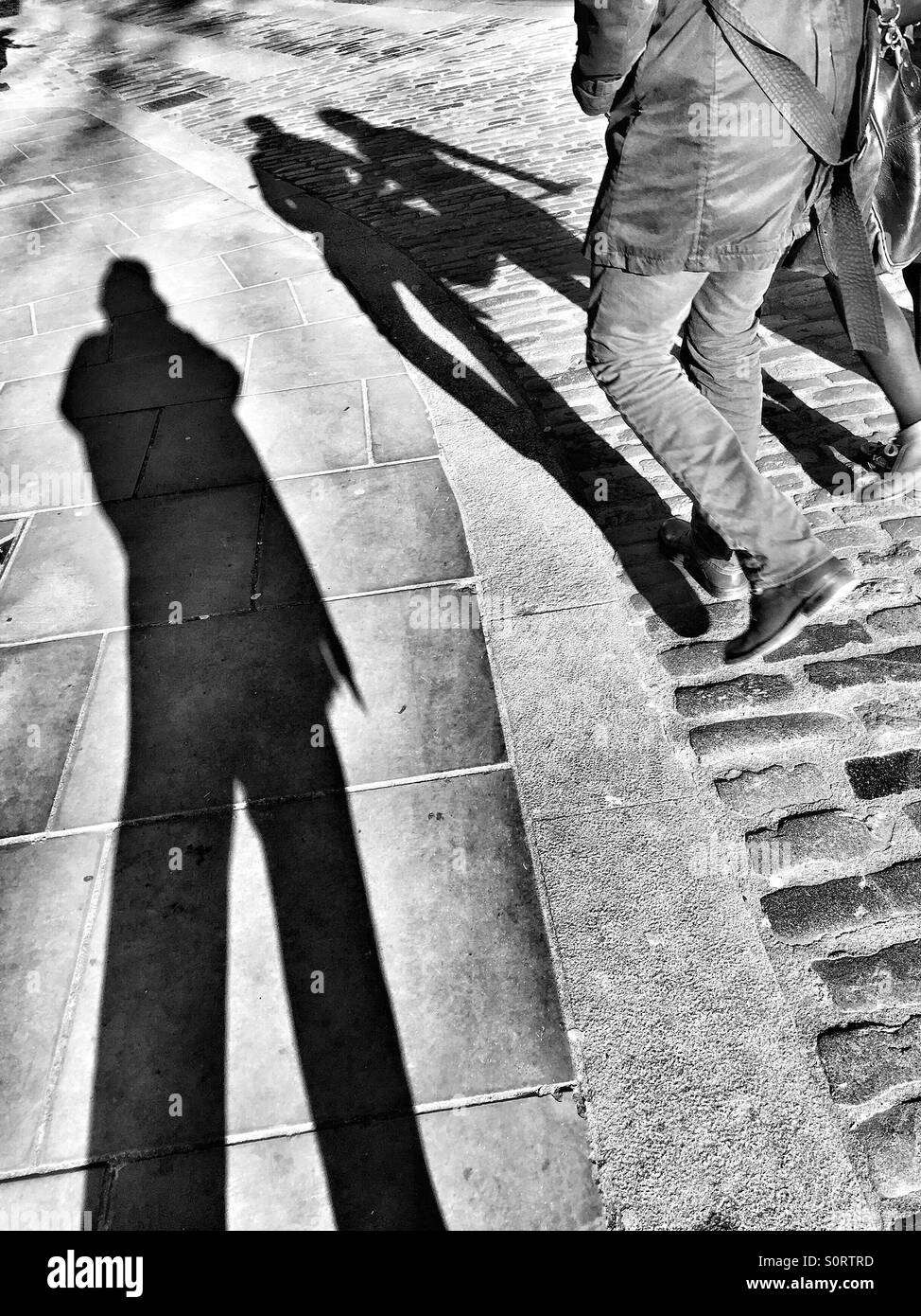 Human shadows hi-res stock photography and images - Alamy