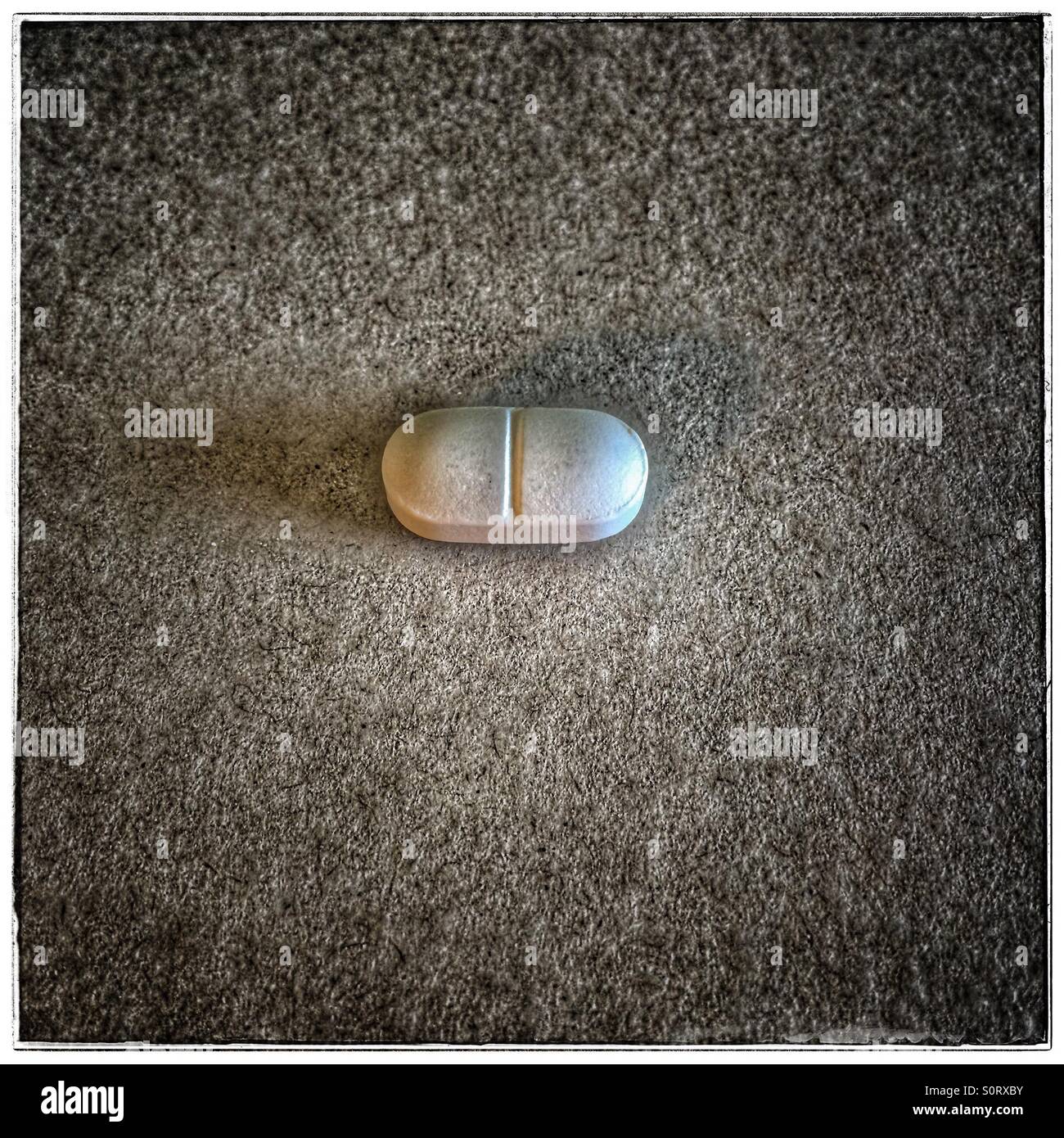 Single calcium tablet Stock Photo - Alamy