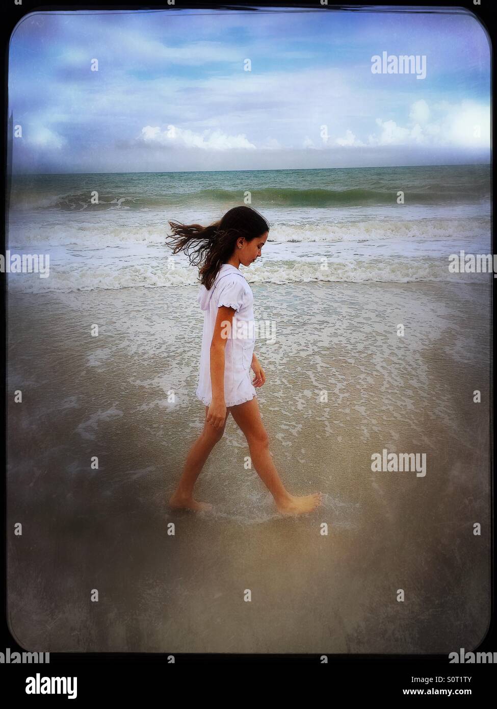 Girl Wading Ocean High Resolution Stock Photography and Images - Alamy