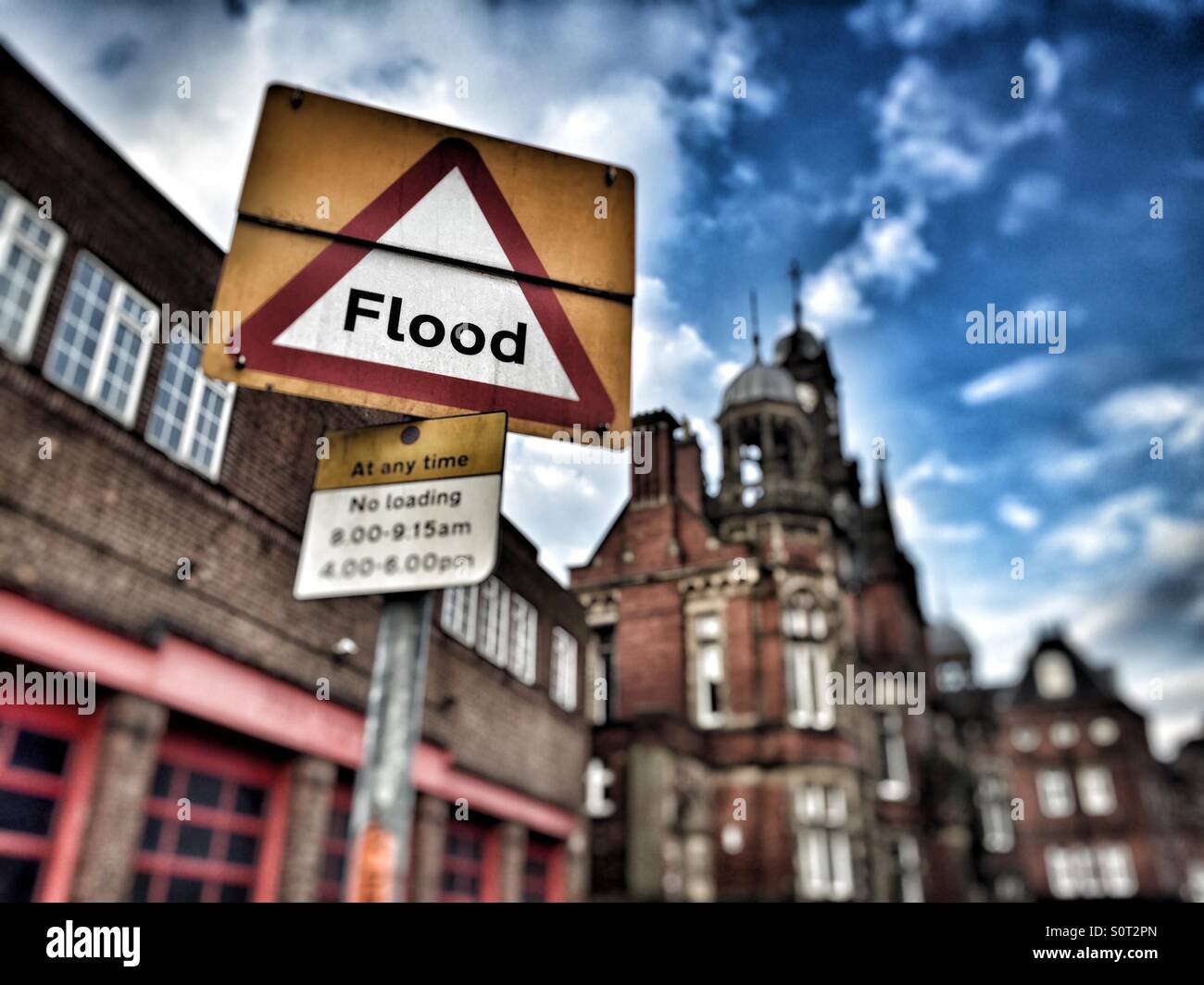 Flood warning triangle hi-res stock photography and images - Alamy