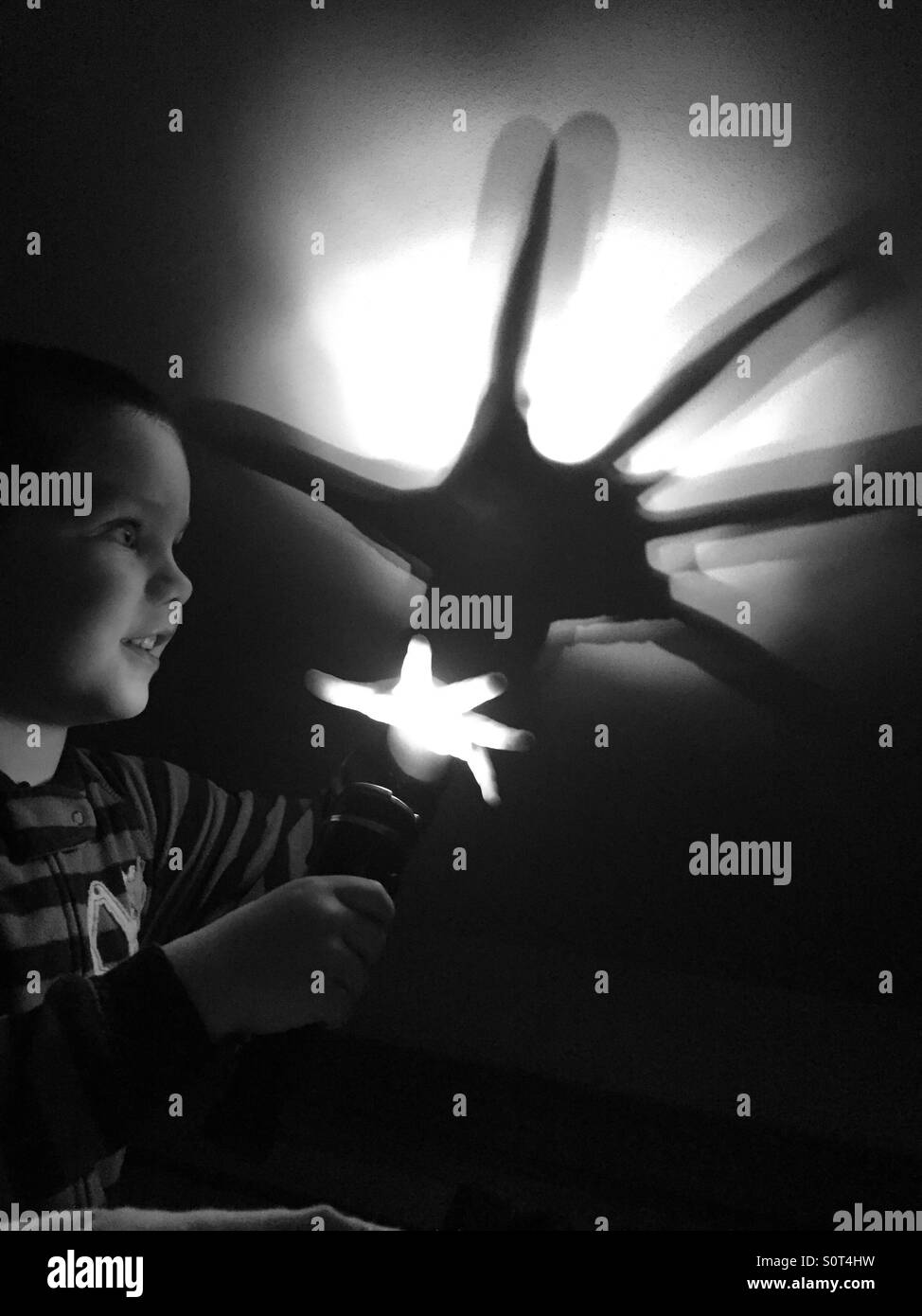 Dark shadows making shapes hi-res stock photography and images - Alamy