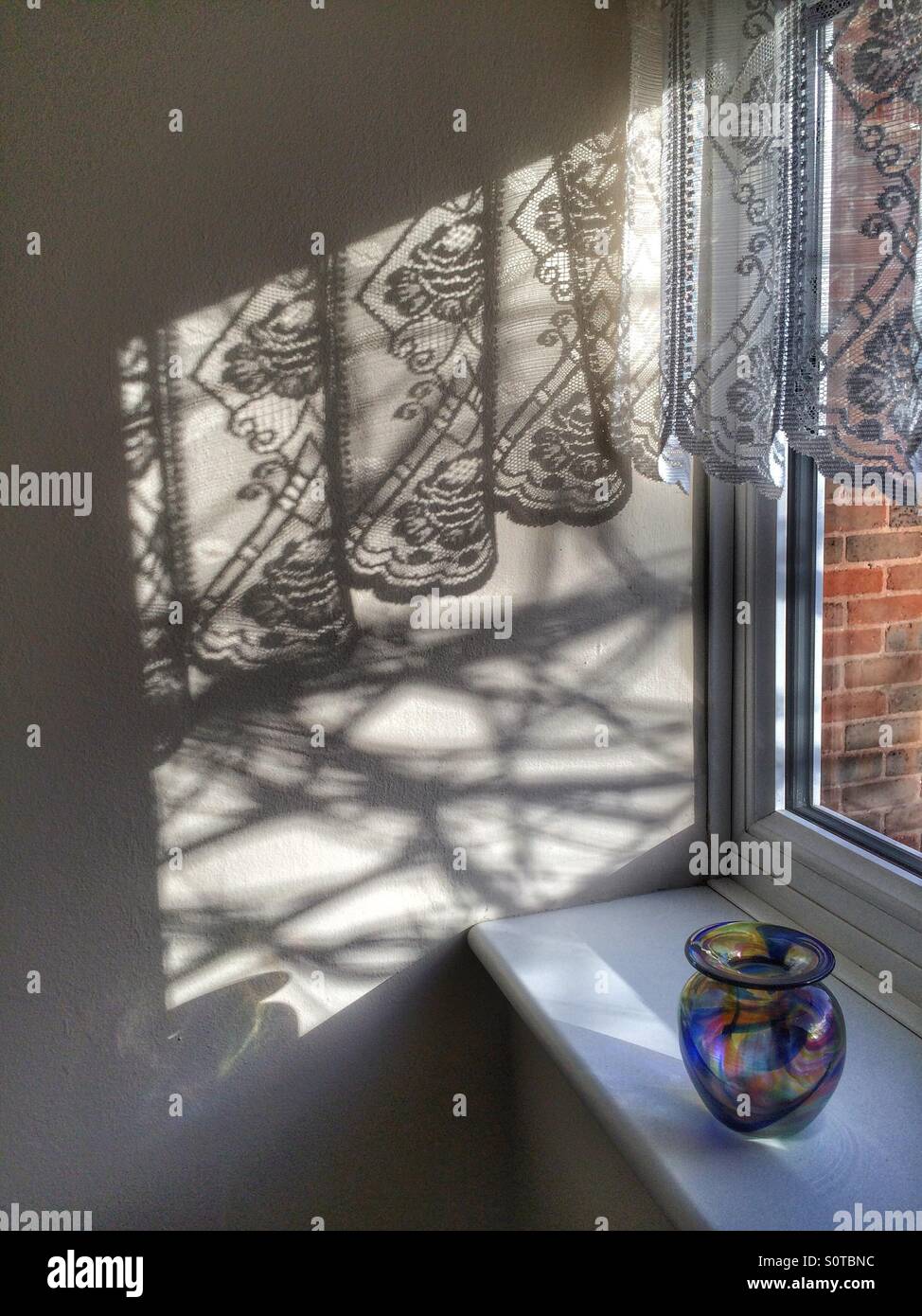 Sunlight through a window Stock Photo - Alamy