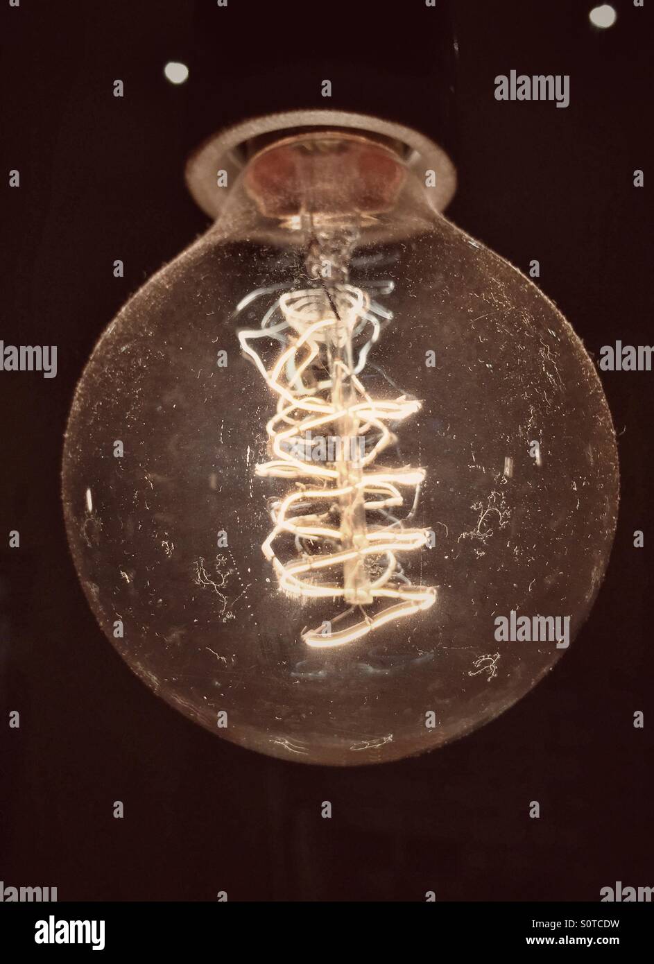 Big filament Edison style globe light bulb Stock Photo - Alamy