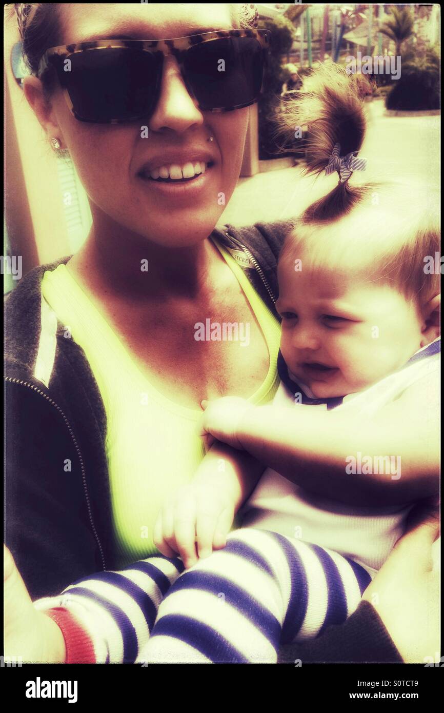 Mother holding her baby daughter Stock Photo - Alamy Mother holding her baby daughter Stock Photo - Alamy