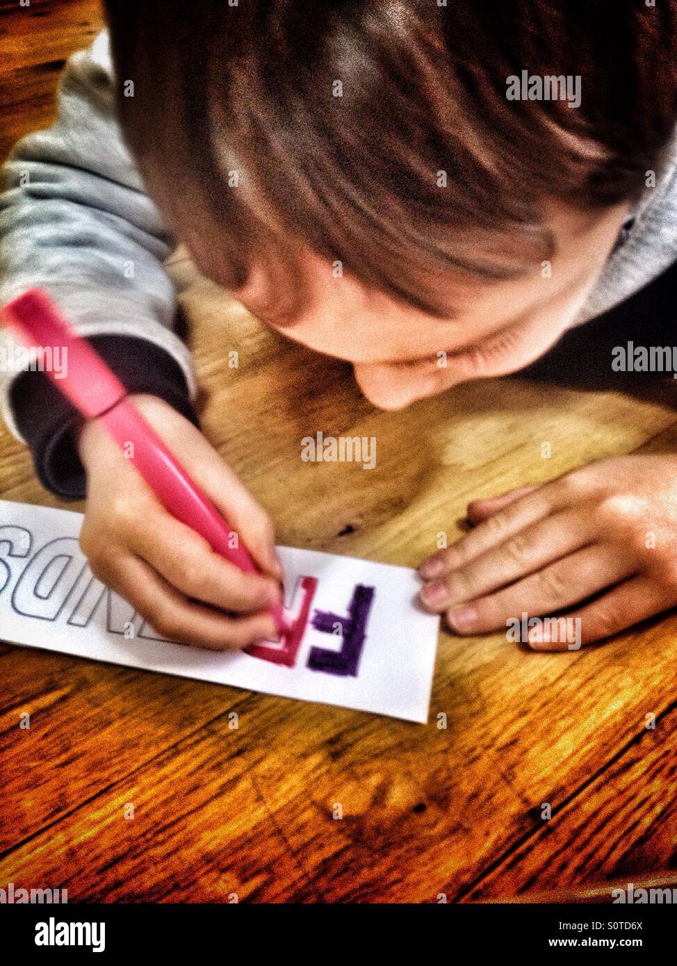 Boy Colouring In Drawing Stock Photos & Boy Colouring In Drawing Stock ...