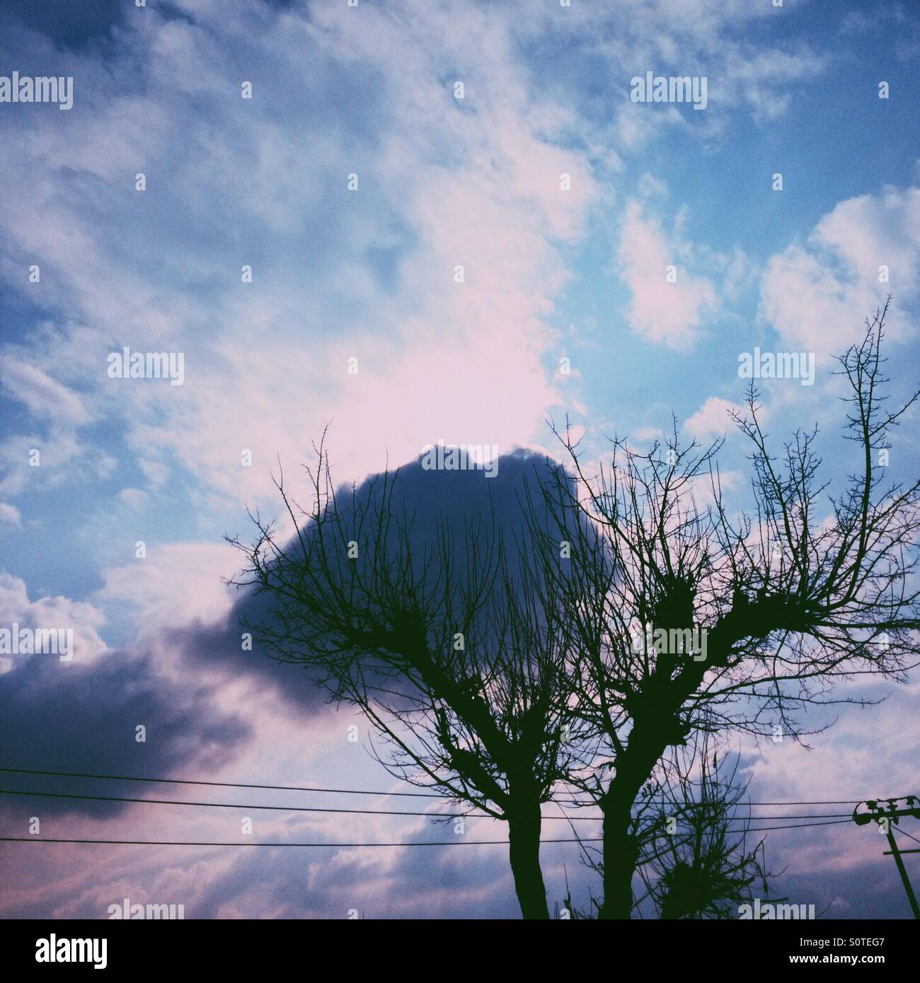 Hidden sun in cloud hi-res stock photography and images - Alamy