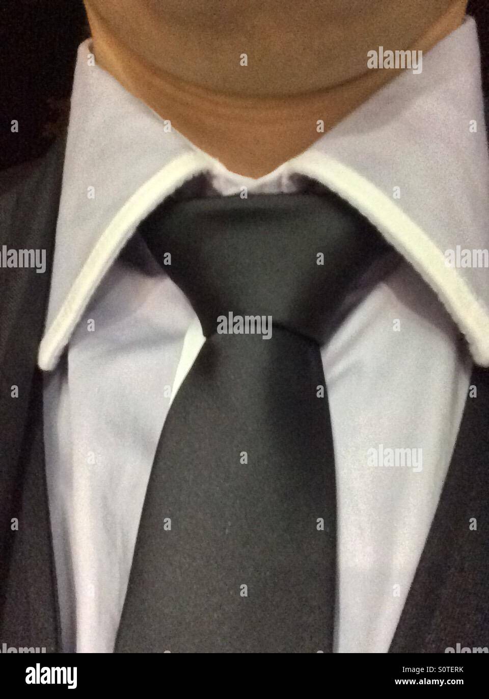 Chest black suit and tie Stock Photo - Alamy