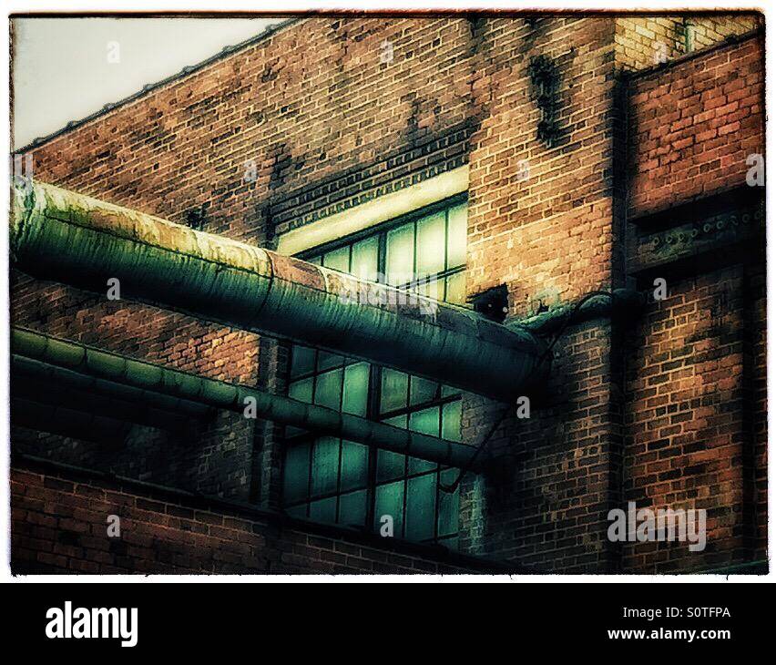 Brick building pipes hi-res stock photography and images - Alamy