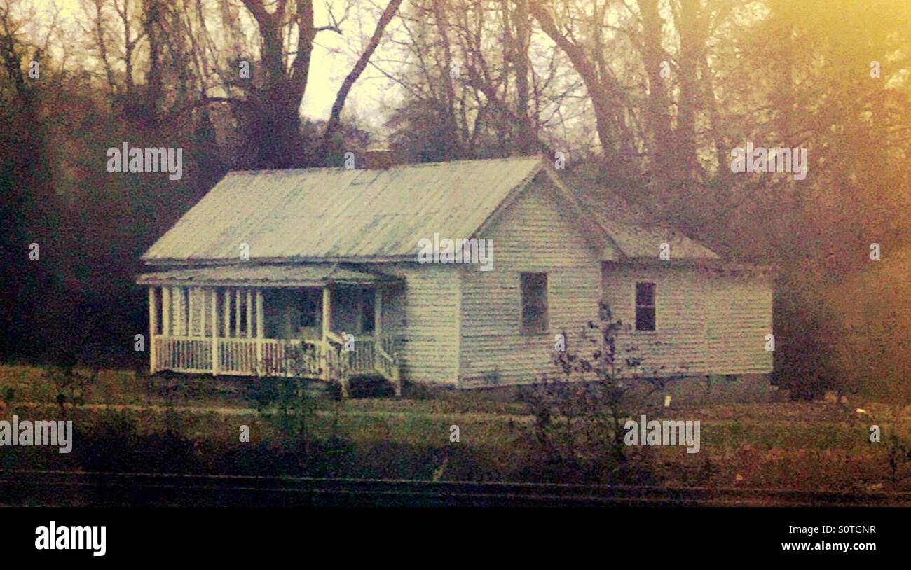 woods behind old house Stock Photo - Alamy