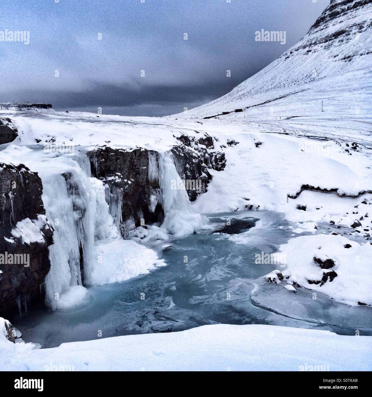 Frozen waterfalls iceland hi-res stock photography and images - Alamy
