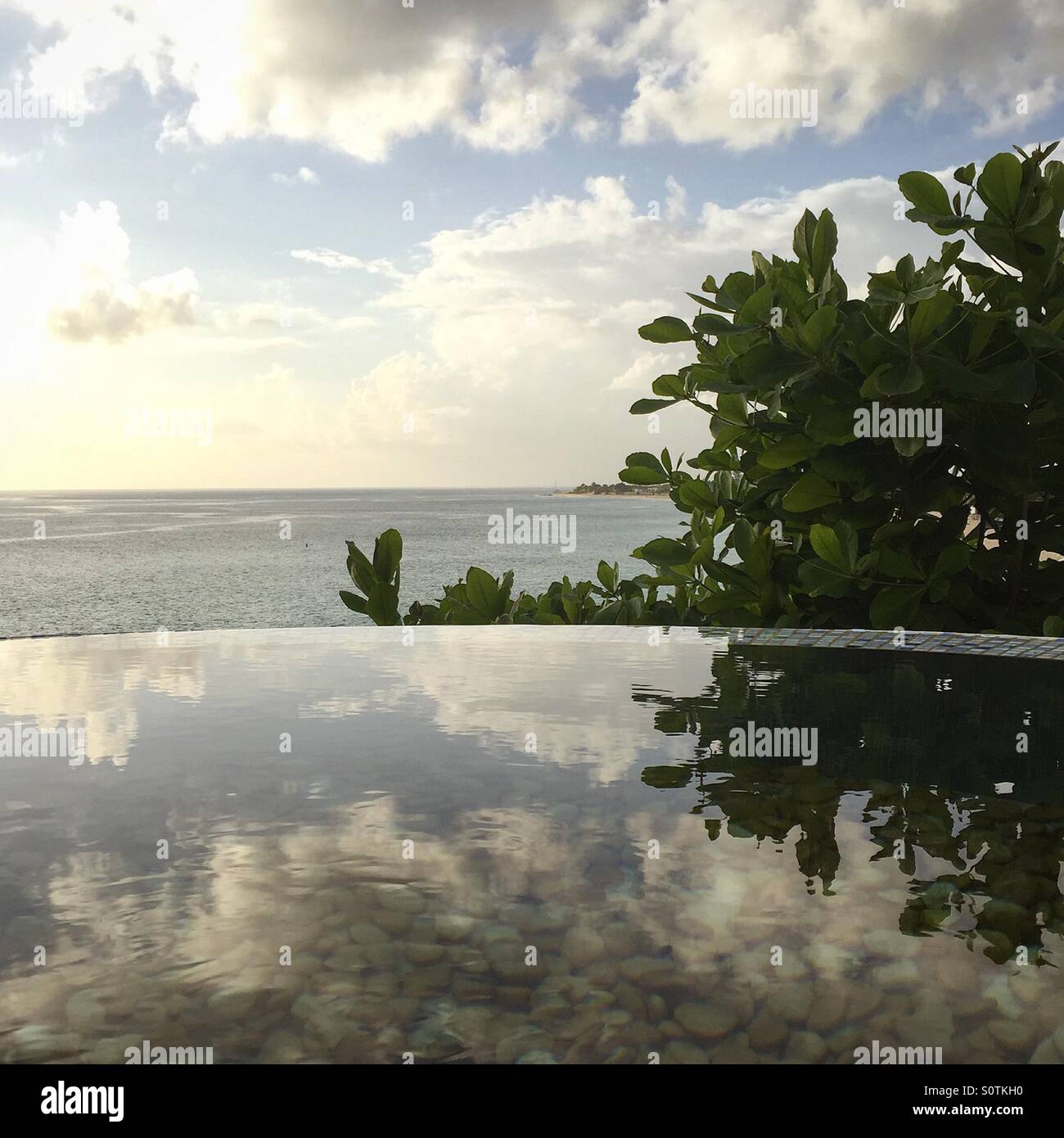 Reflecting pool over ocean Stock Photo - Alamy