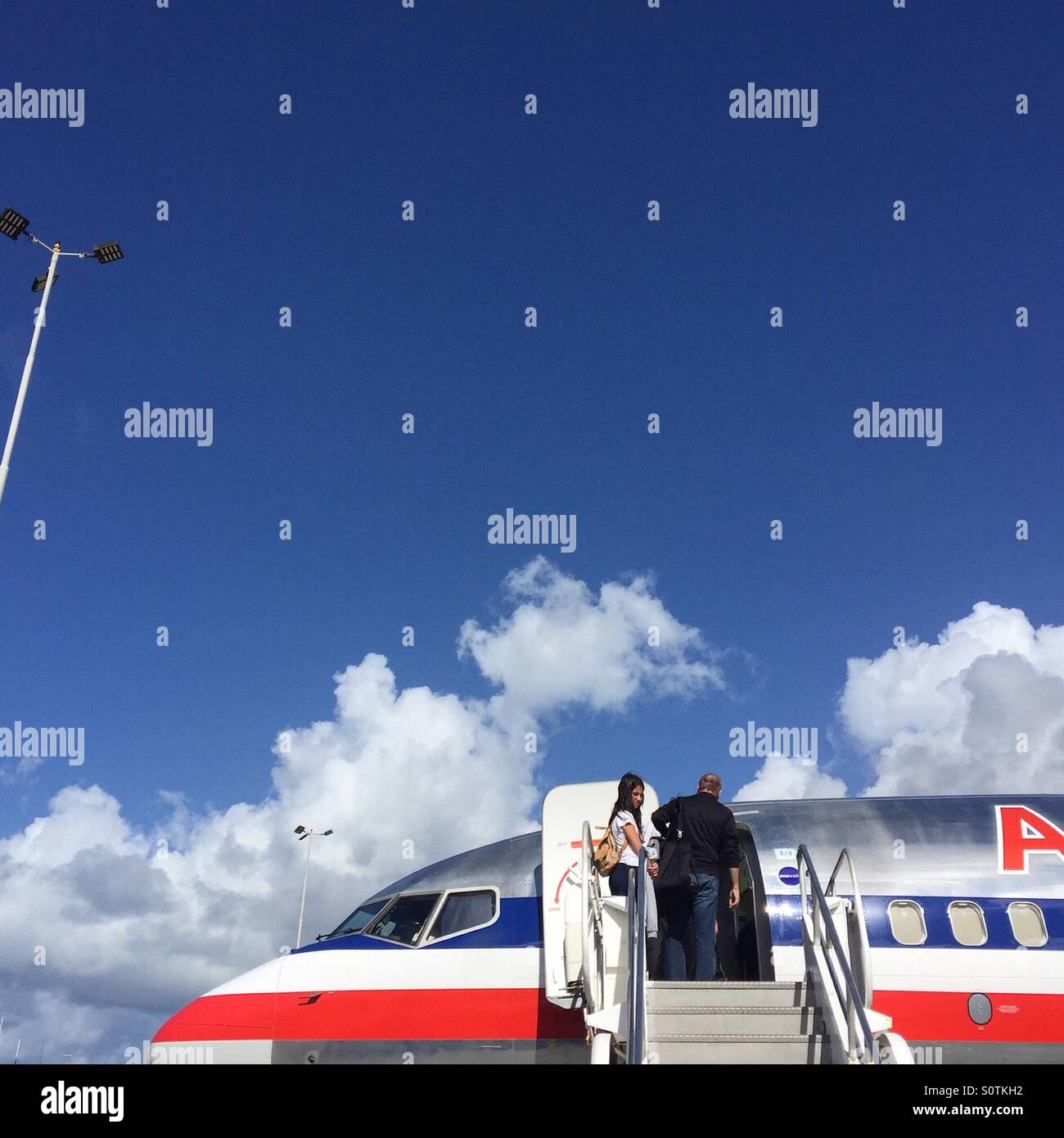 Boarding an airplane Stock Photo - Alamy