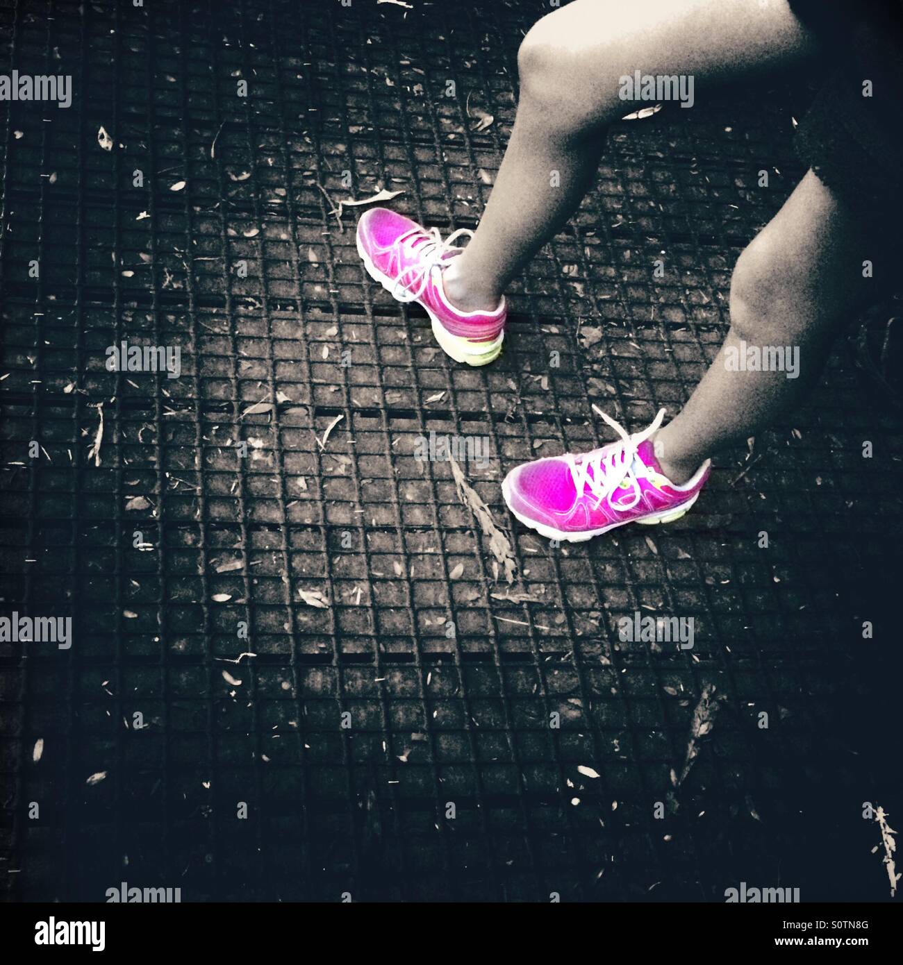 Child looking at ground leaves hi-res stock photography and images - Alamy