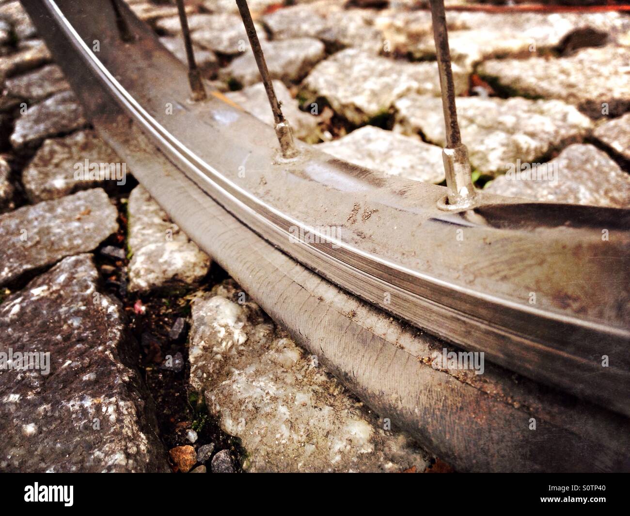 Flat tire on a bicycle wheel Stock Photo - Alamy
