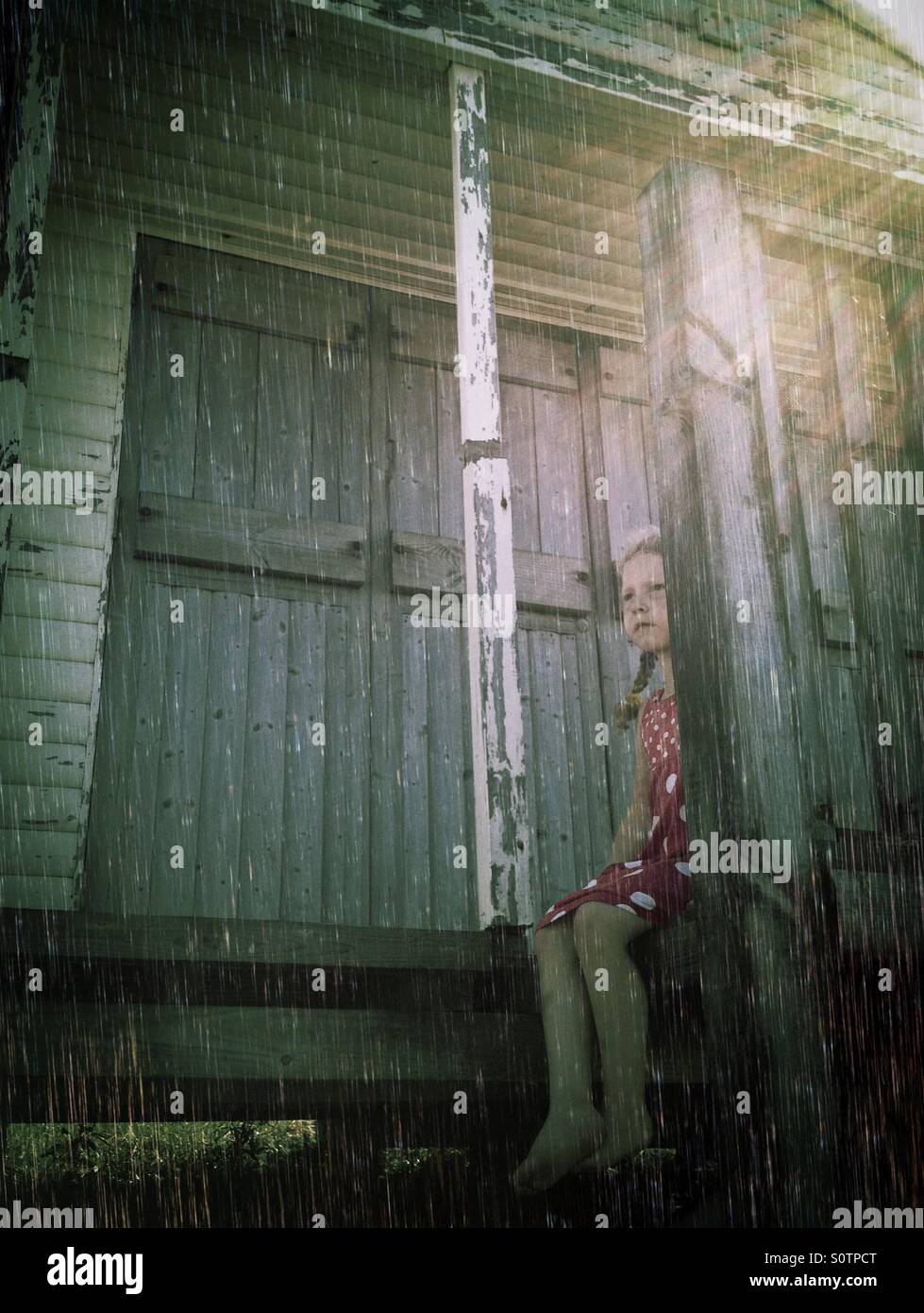 Sheltering from rain hi-res stock photography and images - Alamy