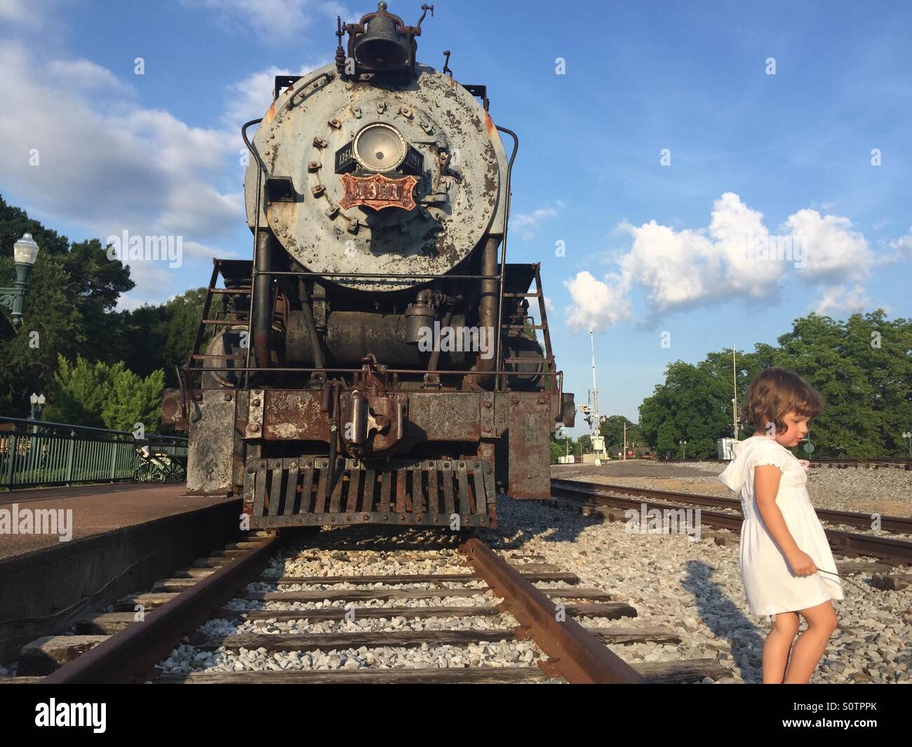 Girl on train tracks hi-res stock photography and images - Alamy