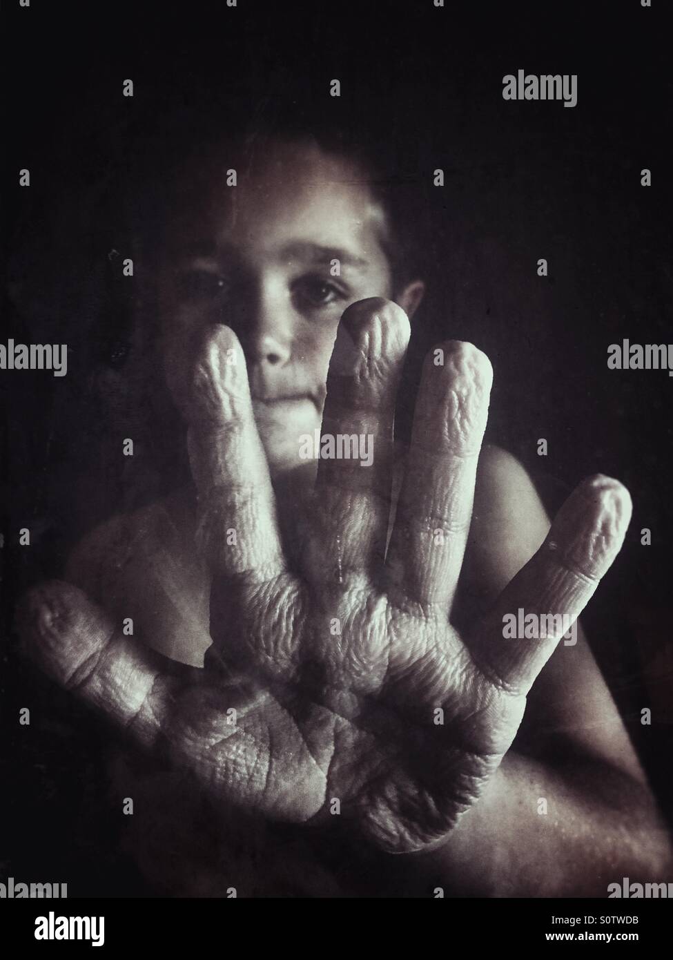 Hand wrinkled hi-res stock photography and images - Alamy