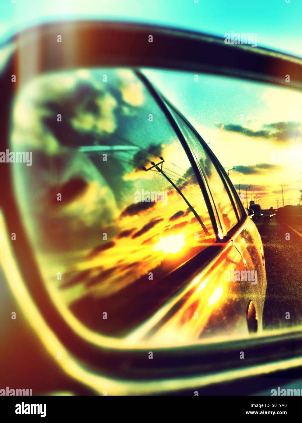 Sunset Car Mirror Stock Photo - Alamy