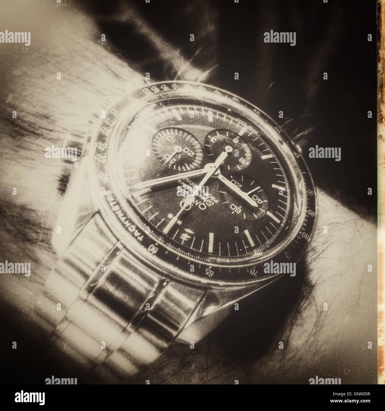 Omega speedmaster professional wristwatch . Black and white photo Stock ...