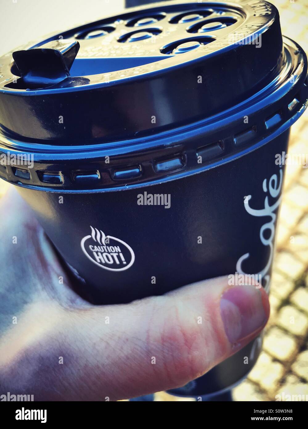 Hot coffee on the go Stock Photo - Alamy