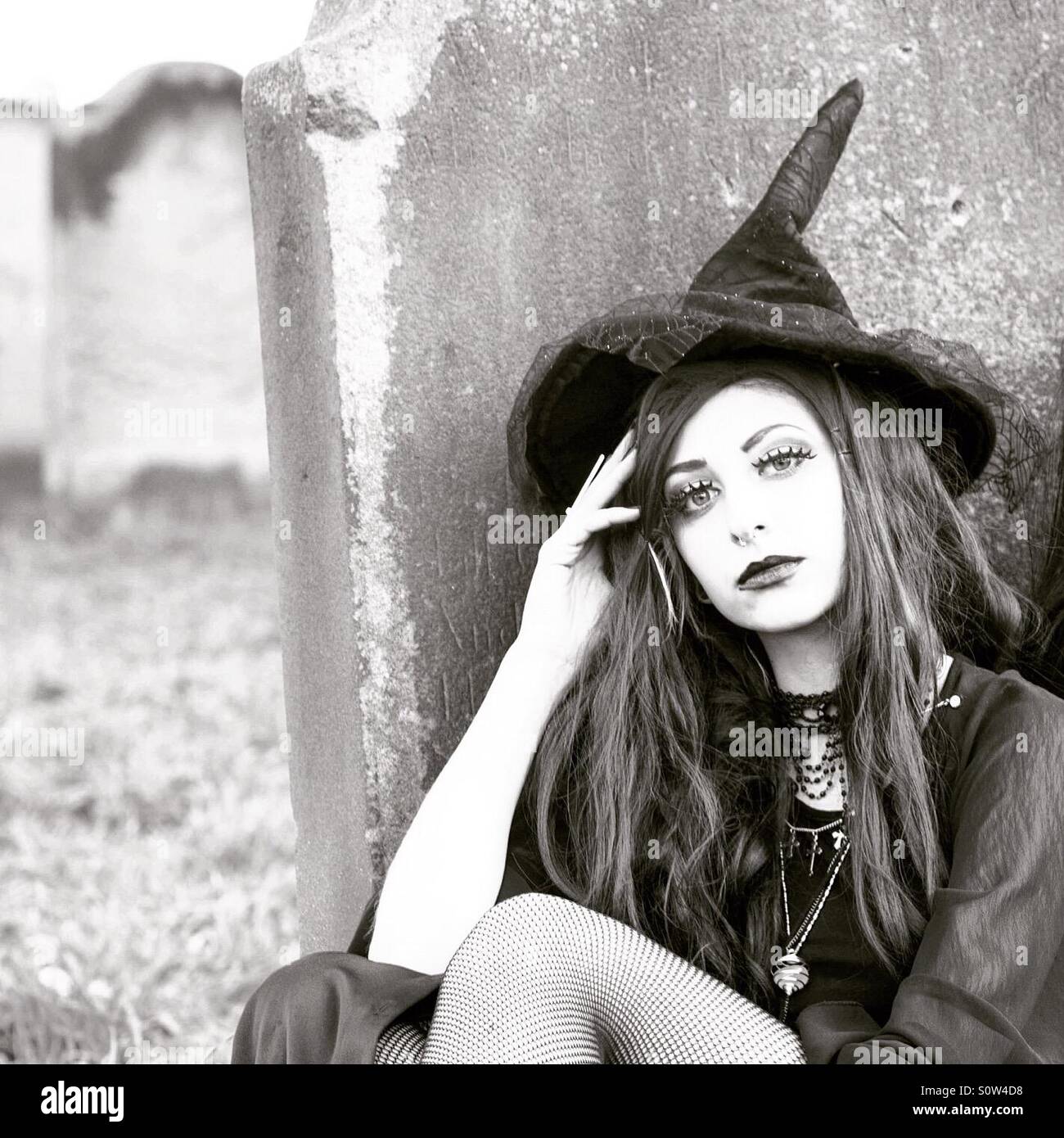 Girl in late teens dressed up in costume as a witch for the Whitby goth ...