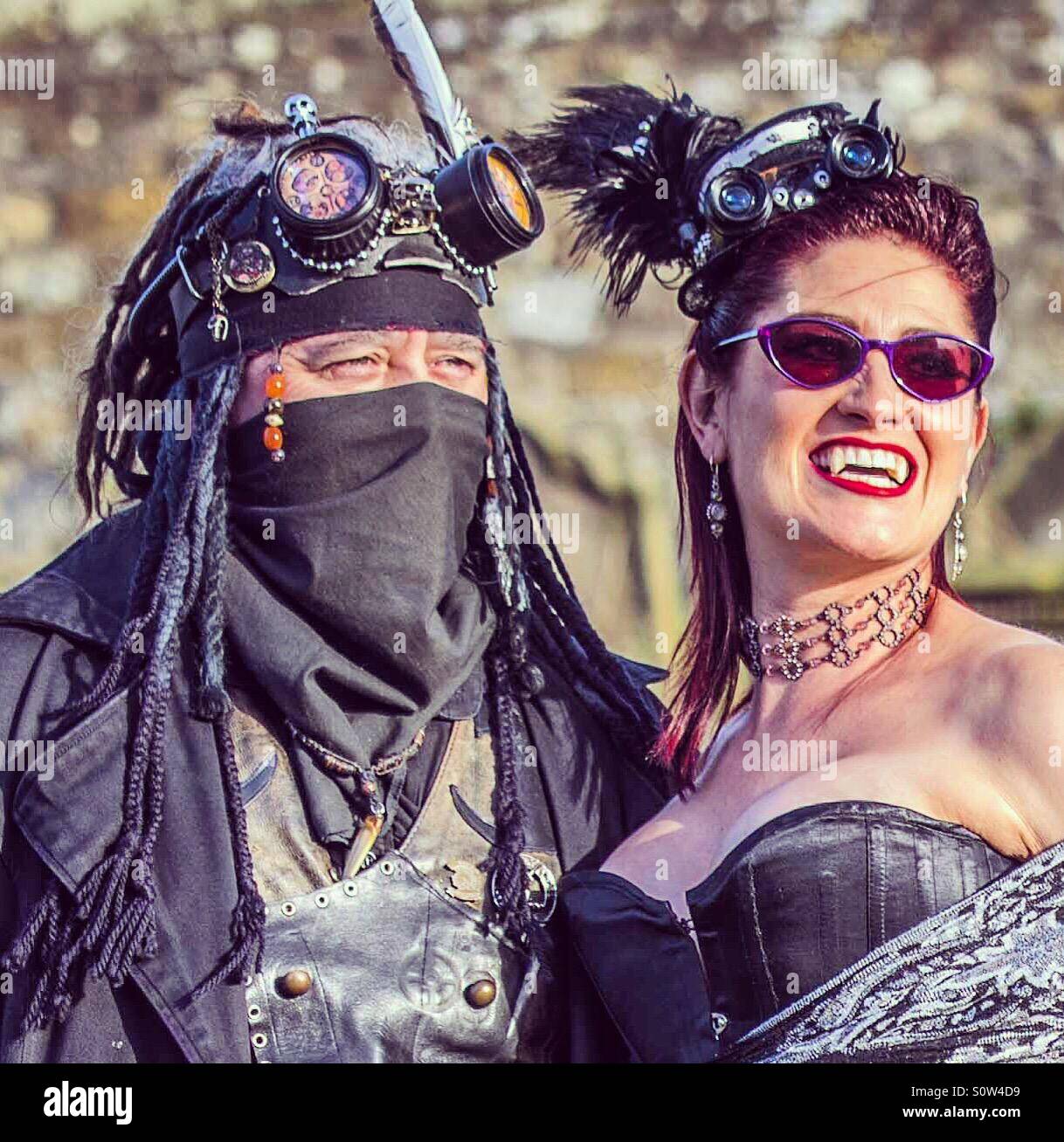 Couple in fancy dress at the Whitby goth weekend Stock Photo - Alamy