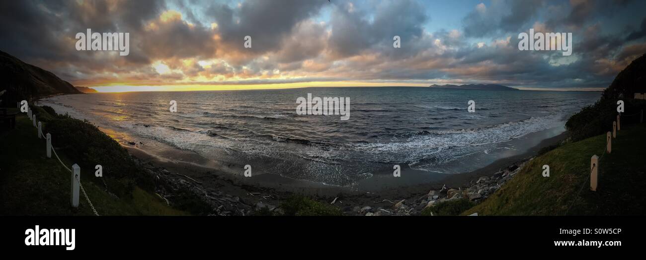 Panoramic view of sunset at Paekakariki Beach New Zealand Stock Photo ...