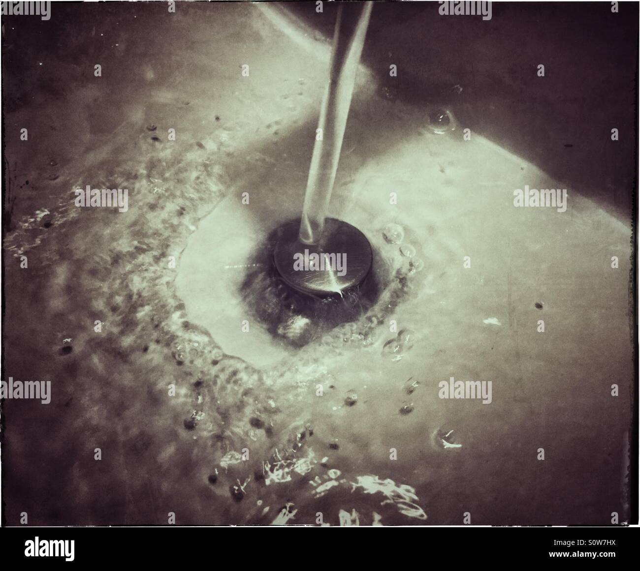Water down drain hi-res stock photography and images - Alamy