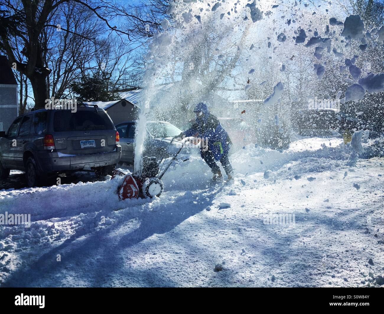 Snowblowing hi-res stock photography and images - Alamy