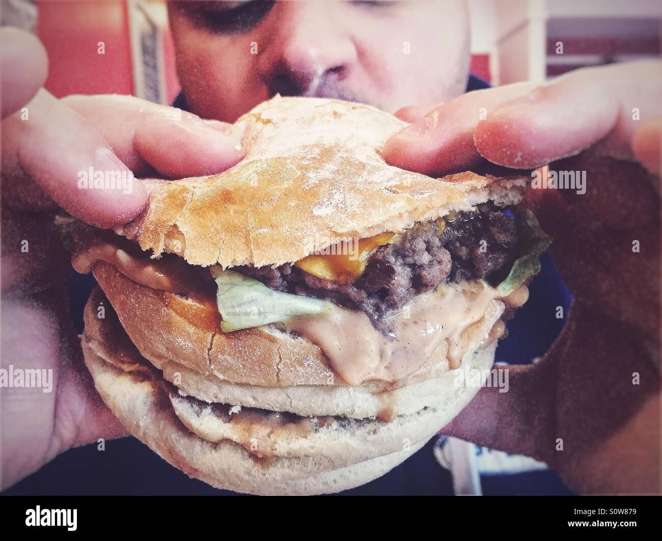 Man eating burger lunch hi-res stock photography and images - Alamy