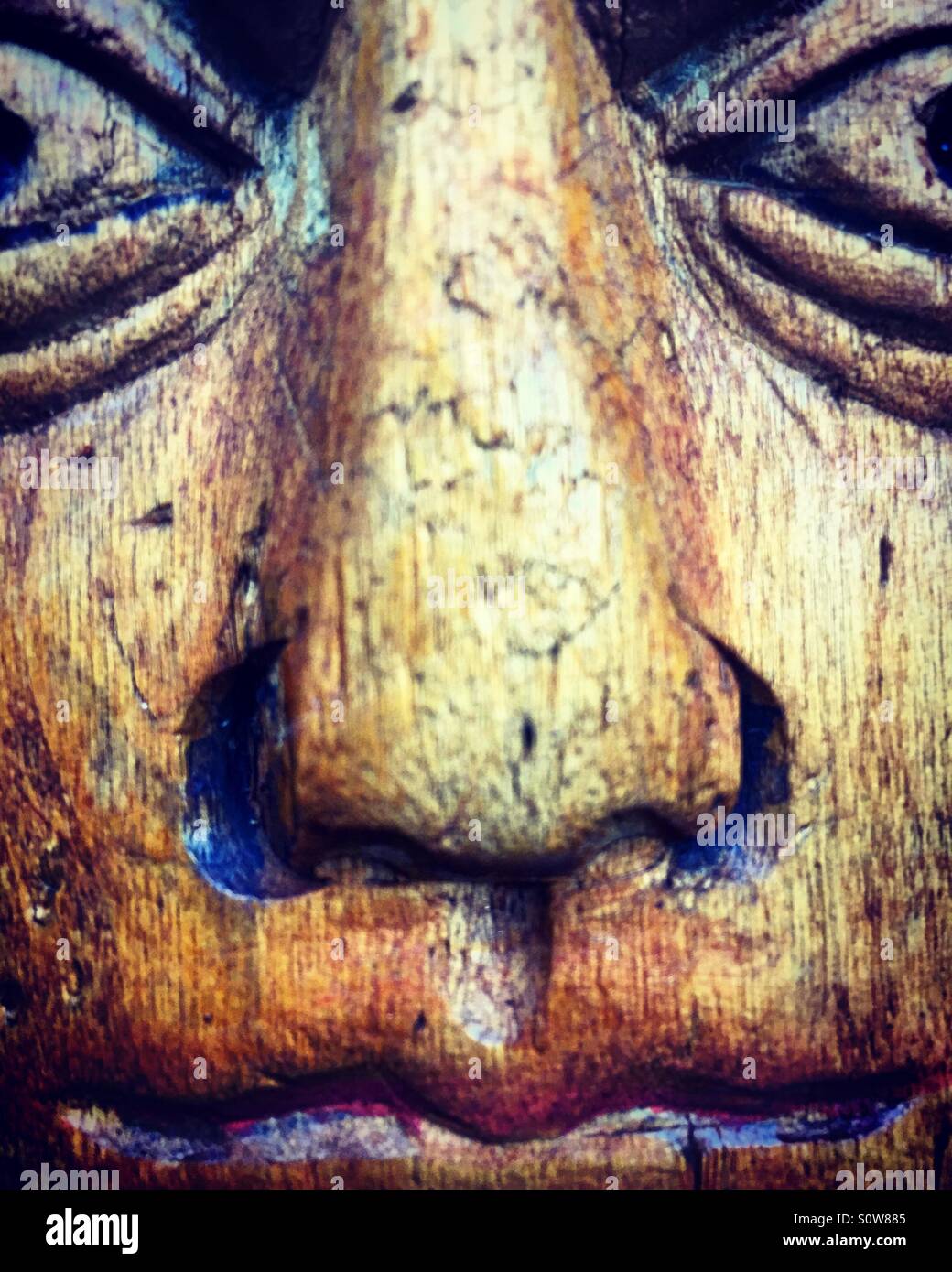 Extreme close-up of a carved wooden face Stock Photo - Alamy