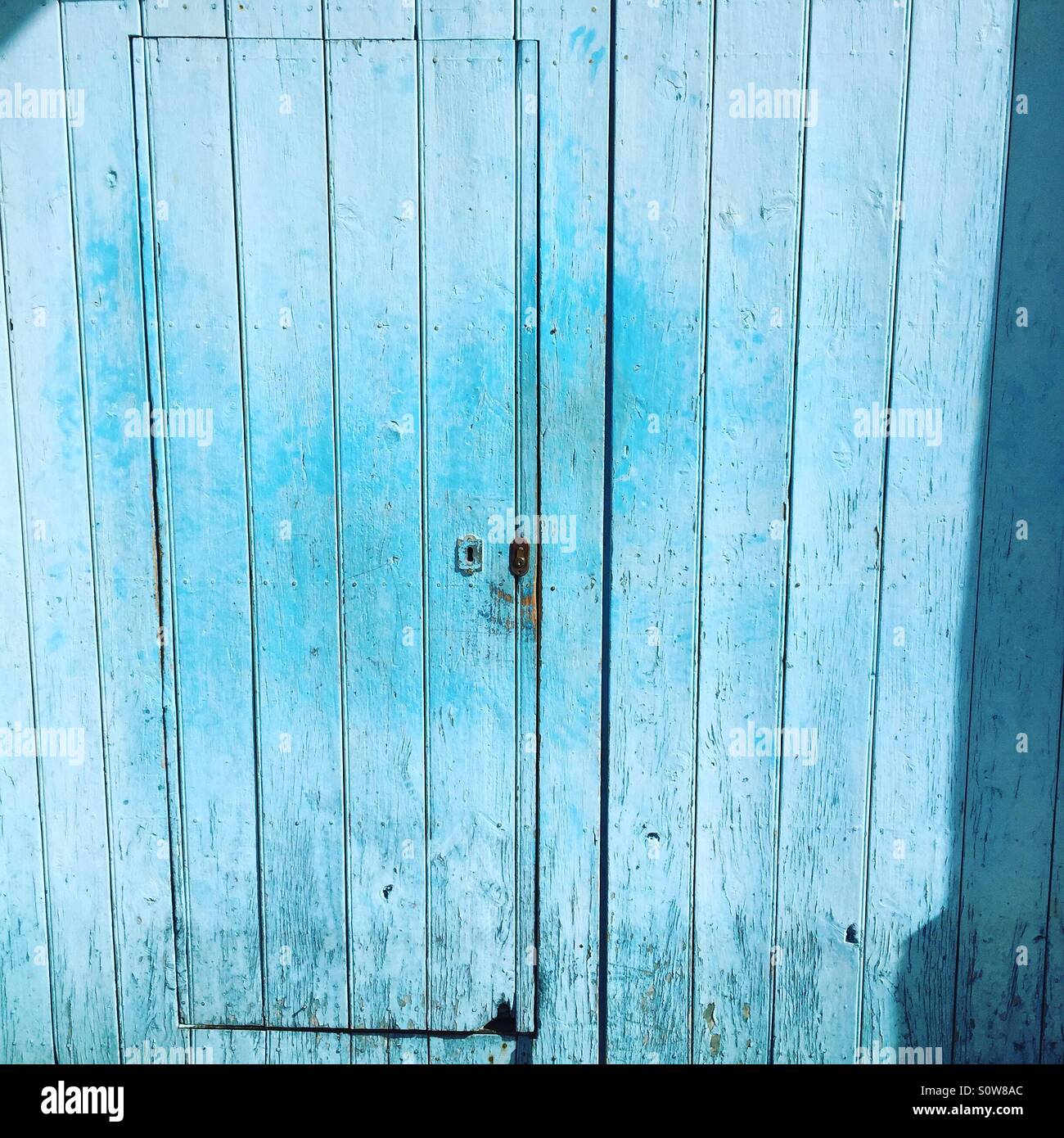 Blue wash wooden fence and gate Stock Photo - Alamy