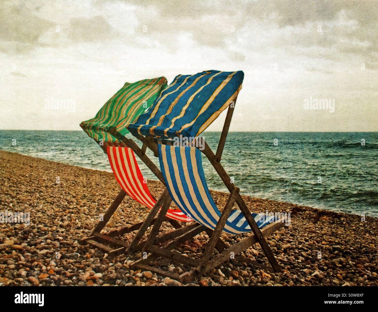 Deckchairs pebbles hi-res stock photography and images - Alamy