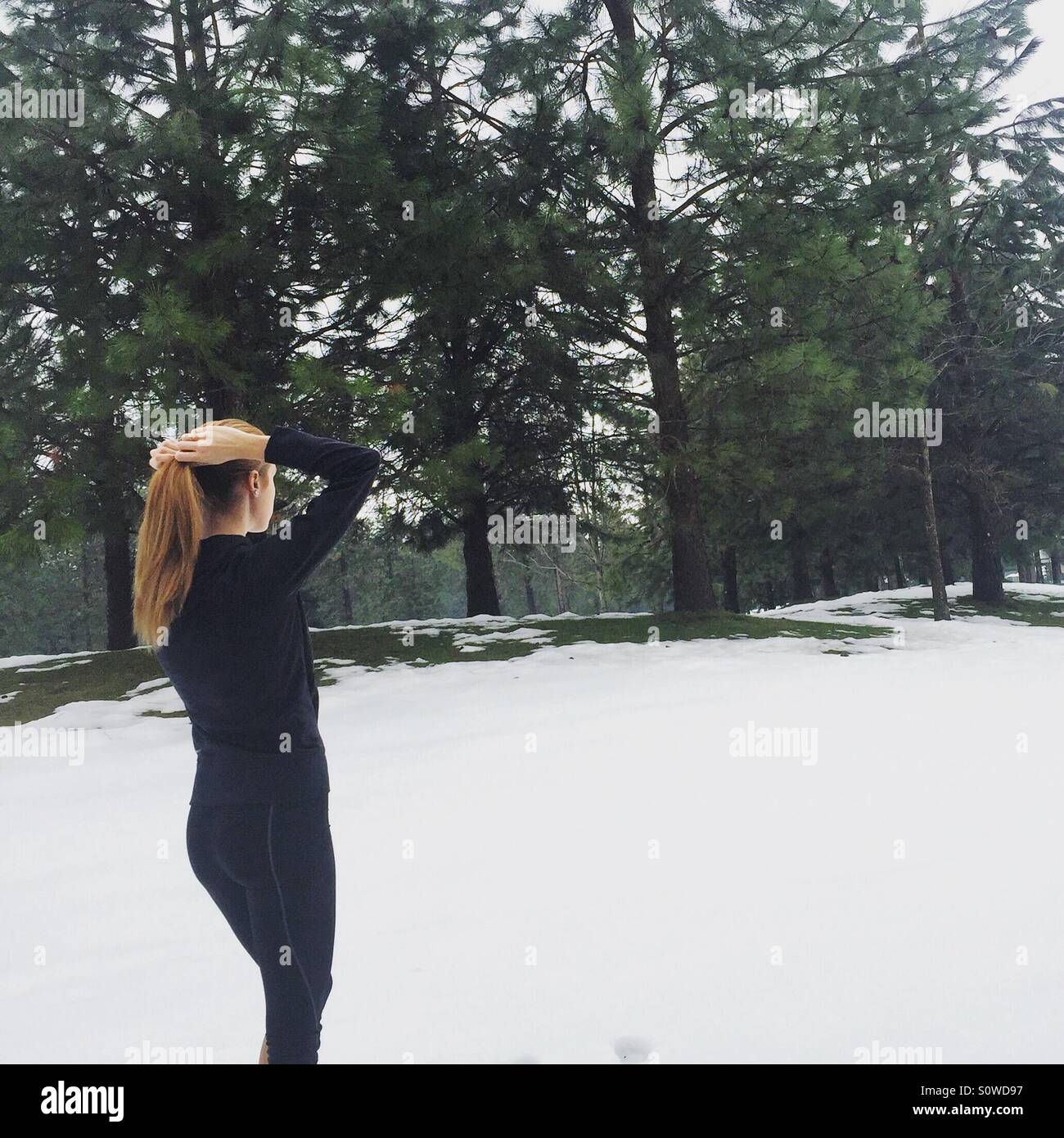 Running in the snow Stock Photo - Alamy