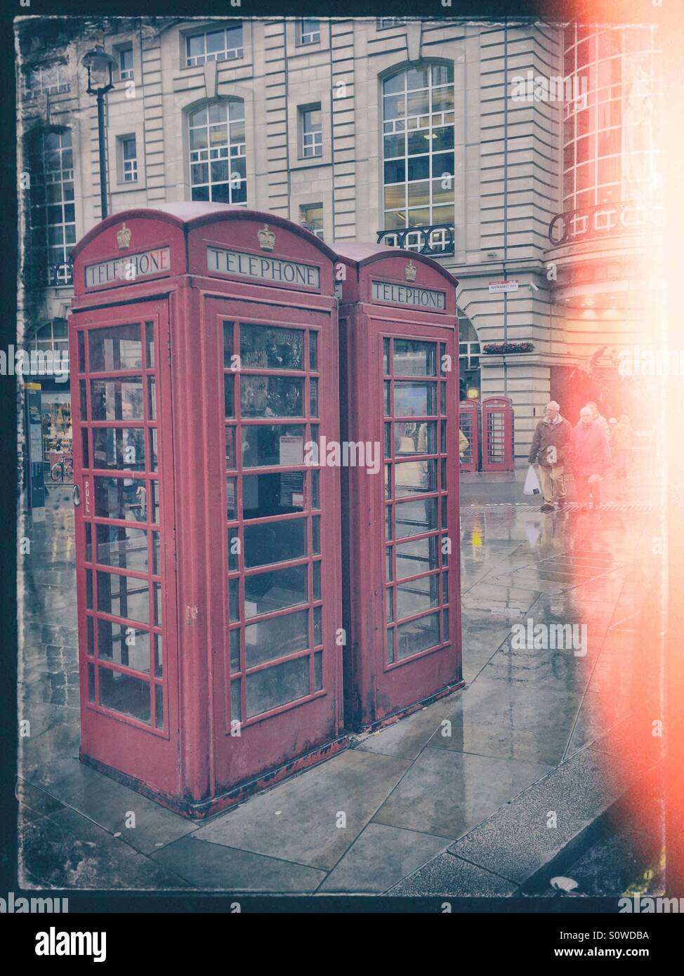 Red phone booths, London Stock Photo - Alamy