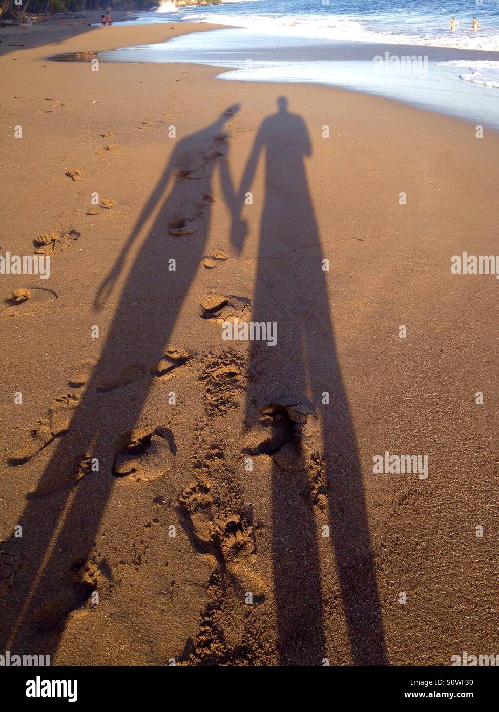 Shadows on Beach Stock Photo - Alamy