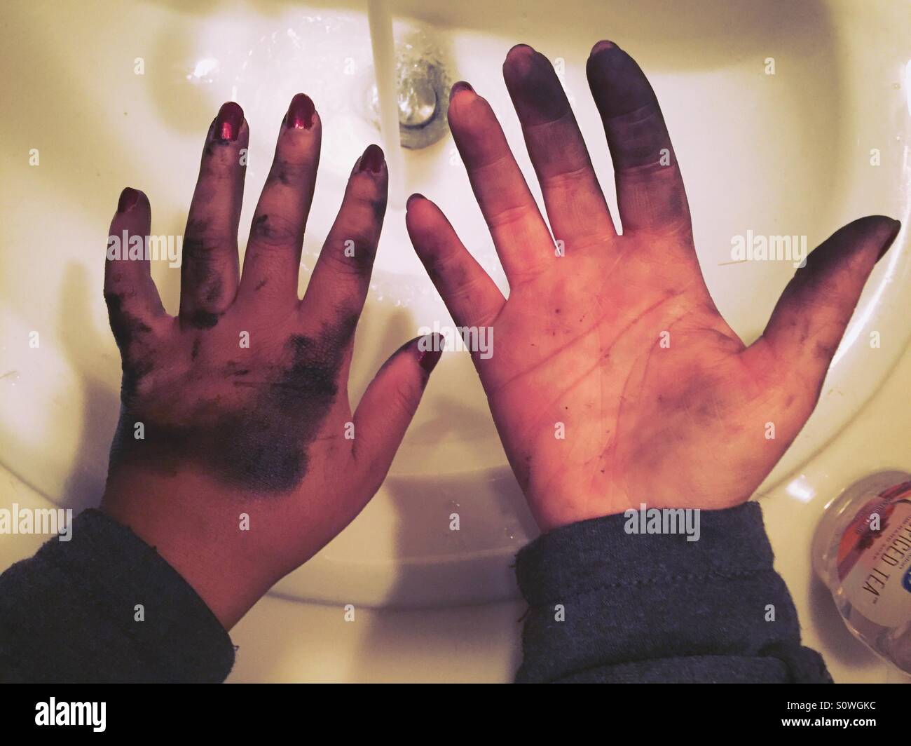 Oily hands hi-res stock photography and images - Alamy