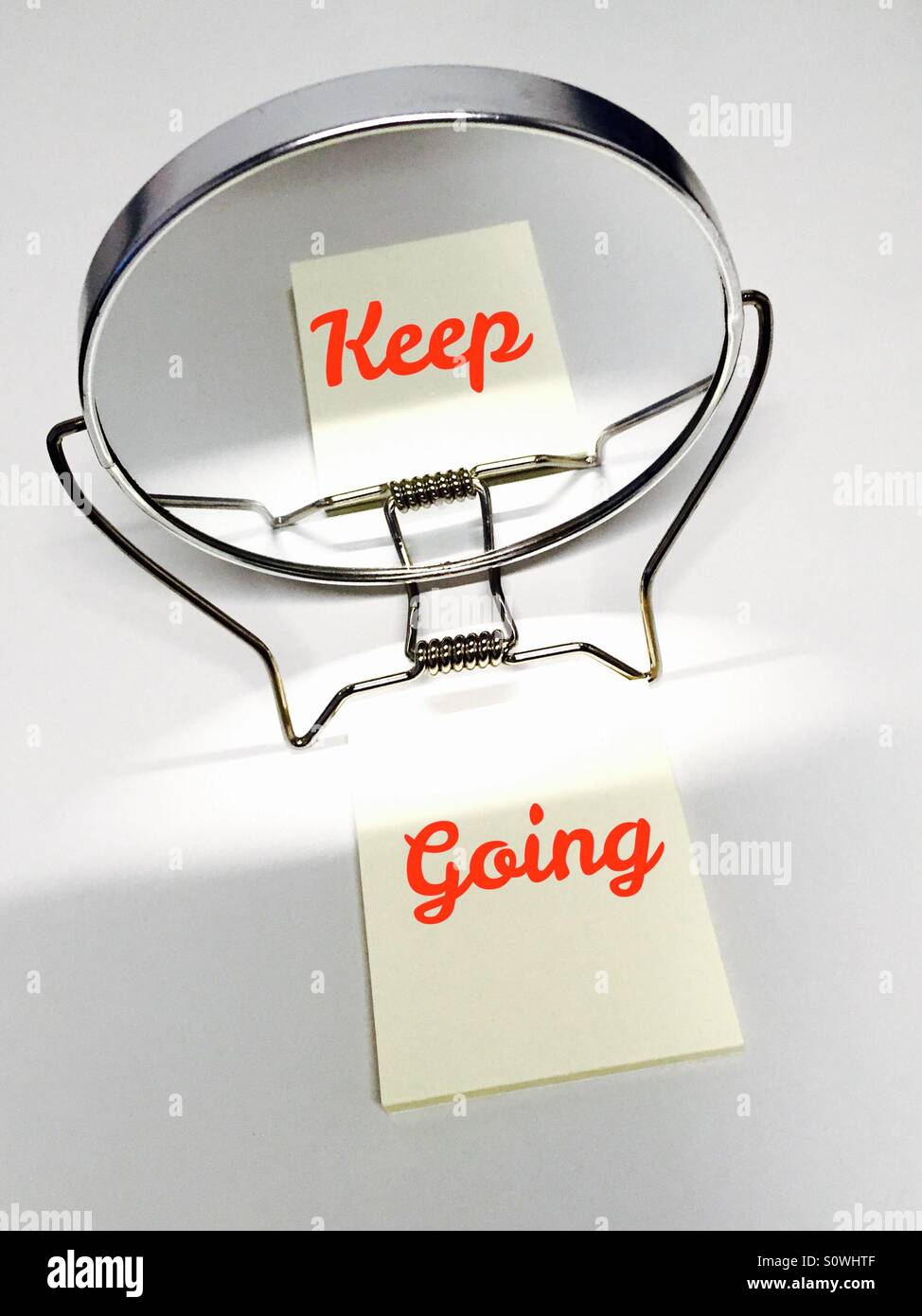 Abstract keep going message Stock Photo - Alamy
