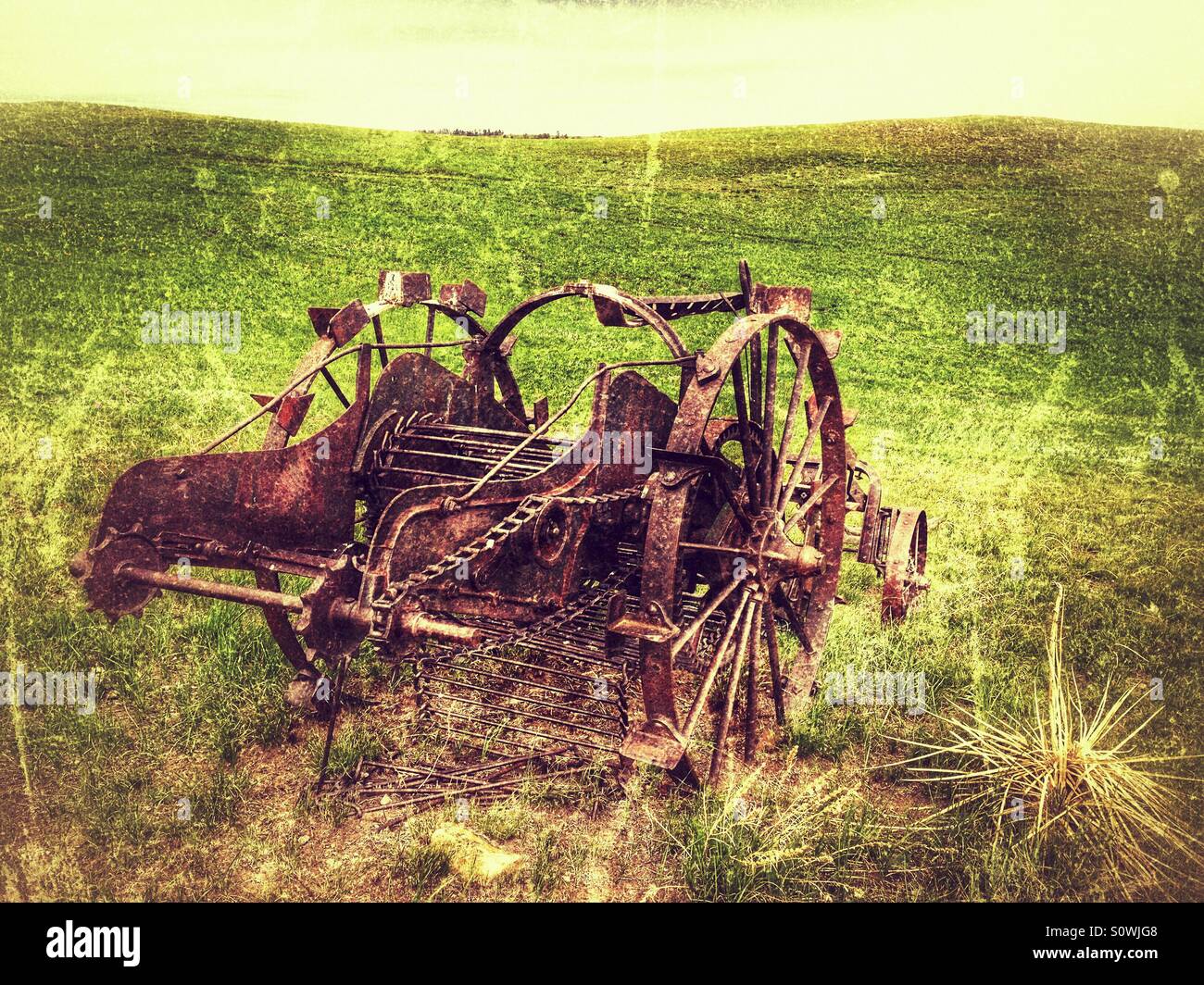 Very old or abandoned antique farming or ranching equipment Stock Photo ...