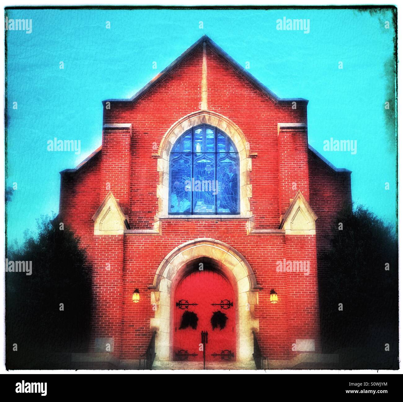 Brick Church using grunge film Stock Photo - Alamy