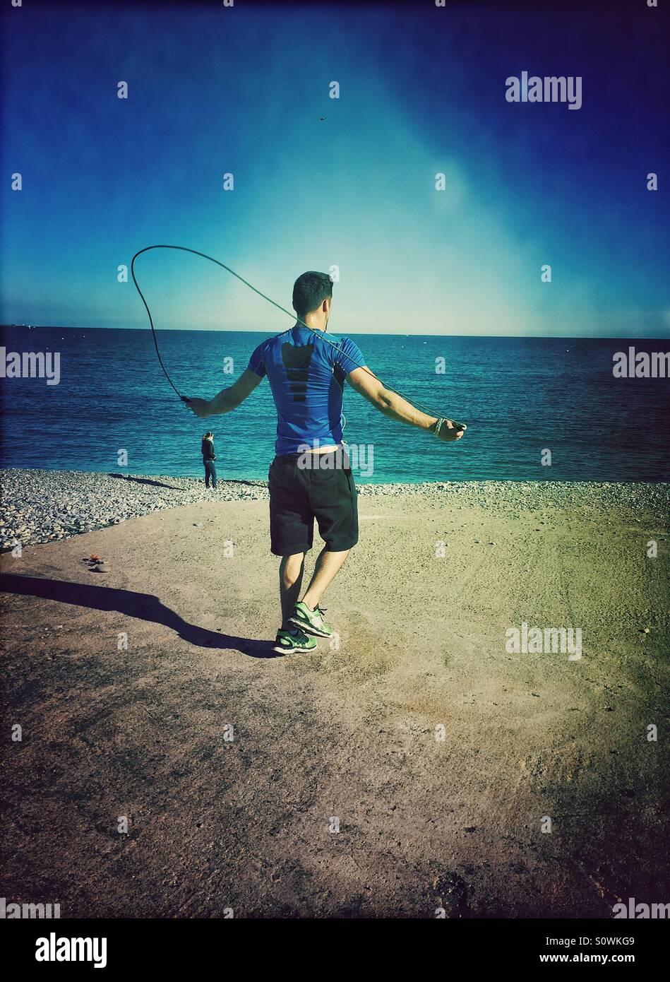 Man jumping rope Stock Photo - Alamy