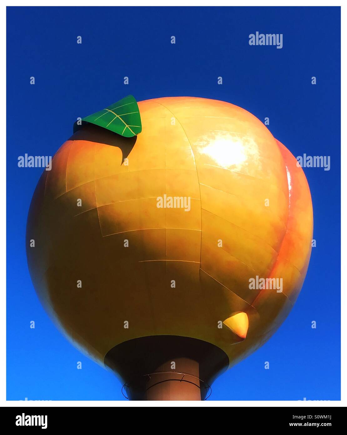 Giant peach in the sky Stock Photo - Alamy