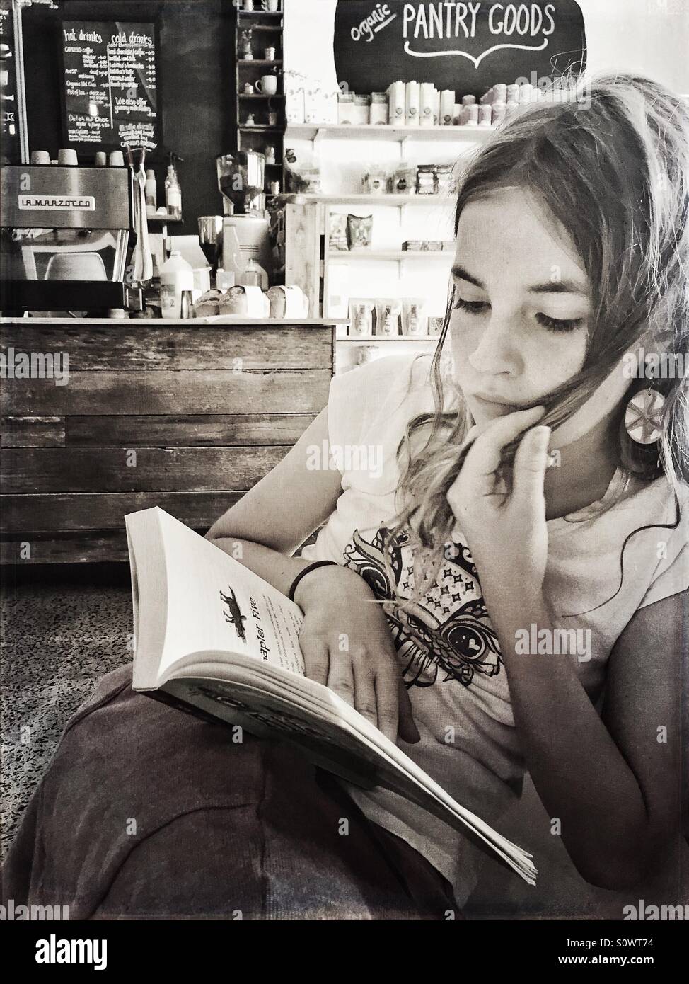 Reading A Book, Cafe High Resolution Stock Photography and Images - Alamy