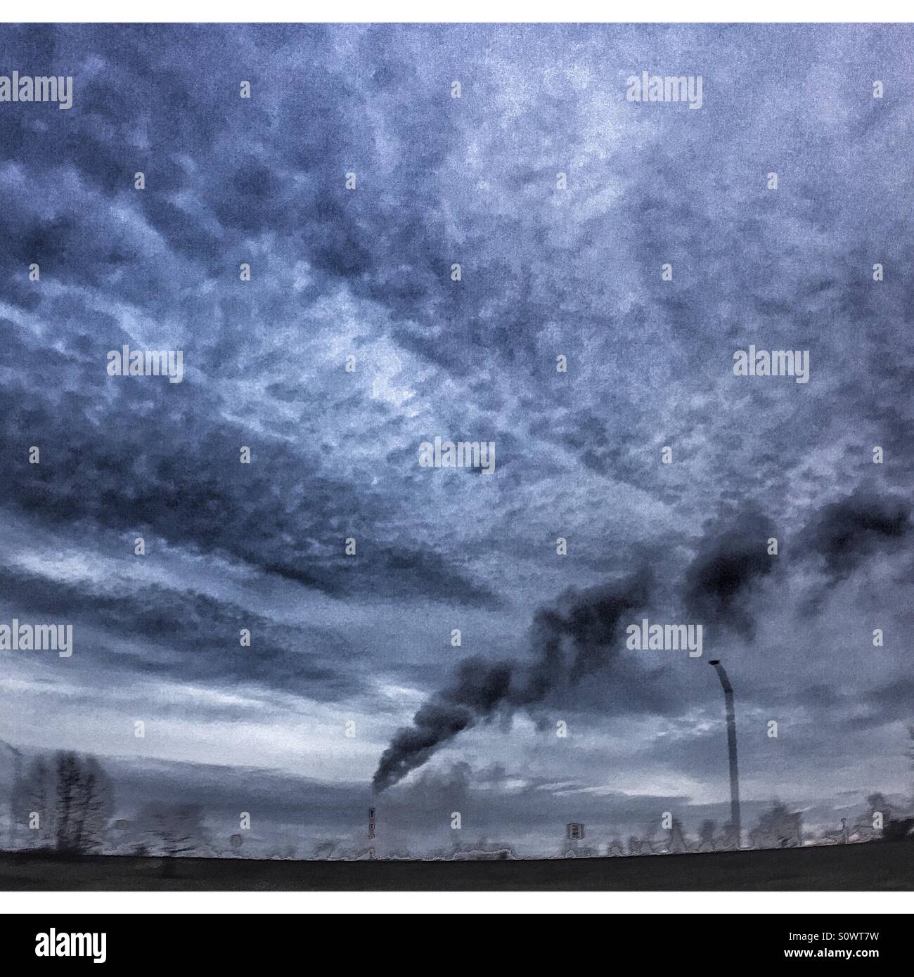 Smoke from a single smoke stack Stock Photo - Alamy