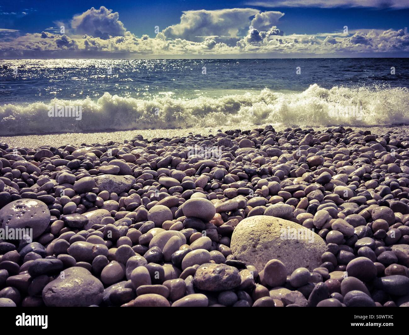 Pebbles and stones at Seashore Stock Photo - Alamy