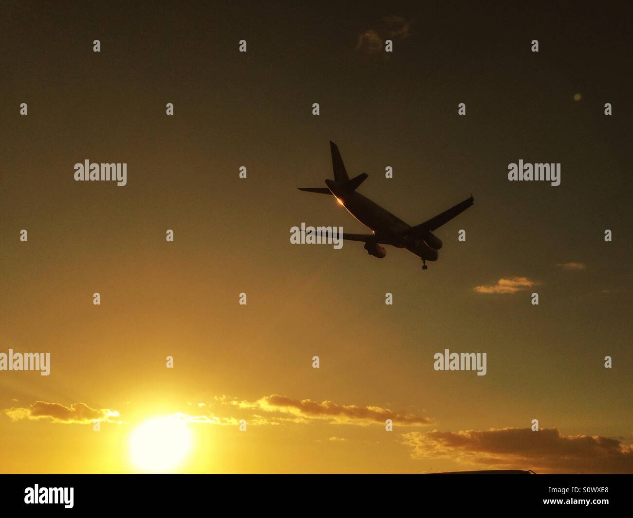 Airbus Jet Airliner Flying Sunset High Resolution Stock Photography and ...