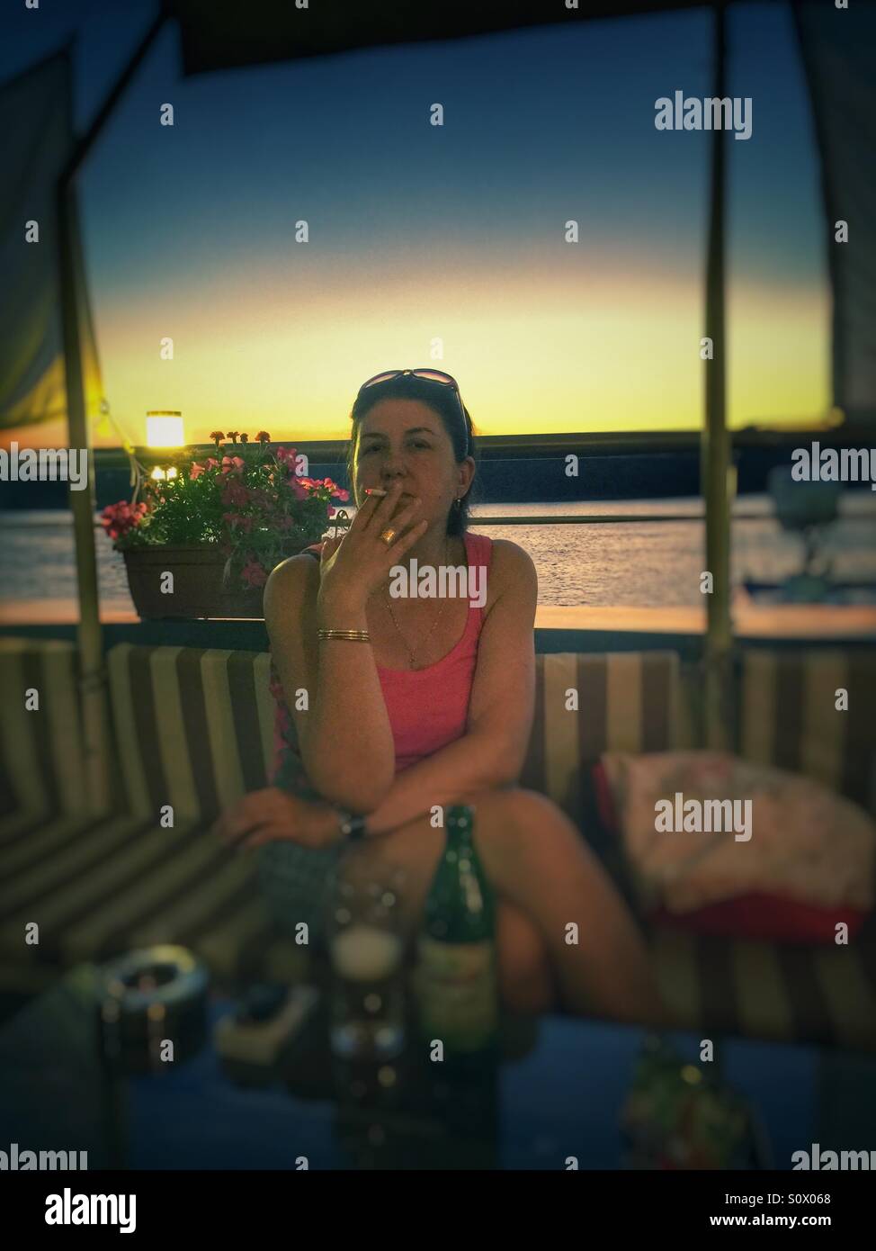 Mature woman smoking hi-res stock photography and images - Alamy