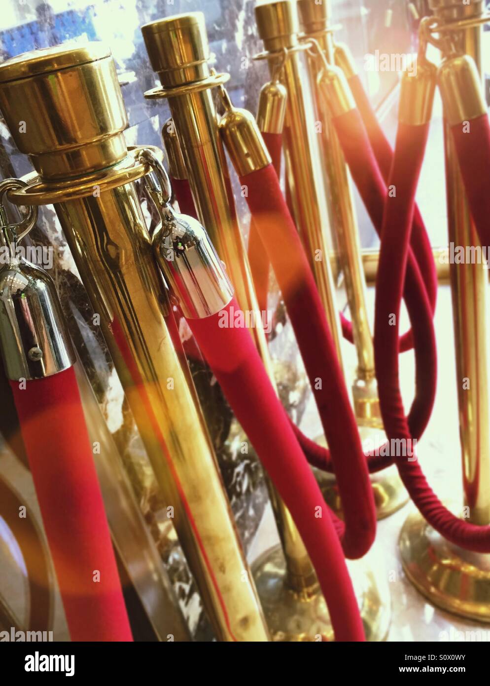 Brass stanchion with red velvet rope hi-res stock photography and ...