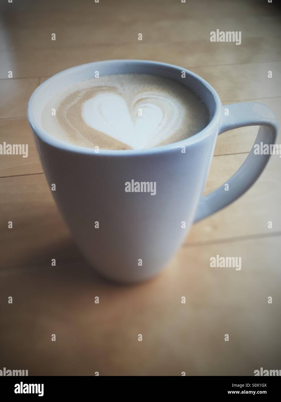 Cup of latte Stock Photo - Alamy