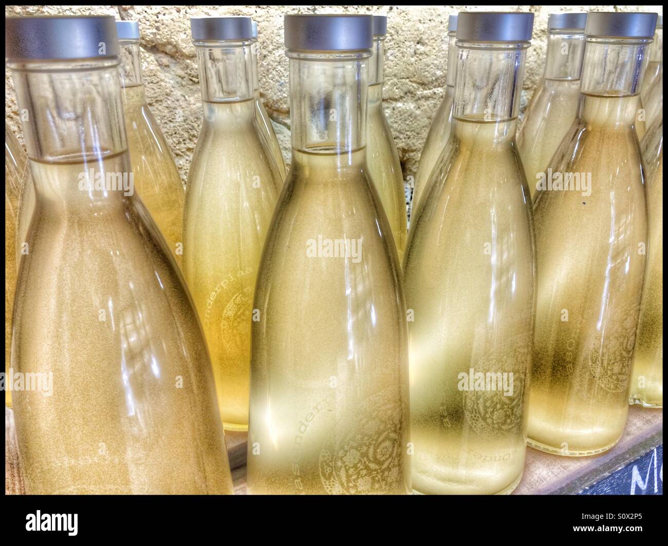 Row of bottles Stock Photo - Alamy